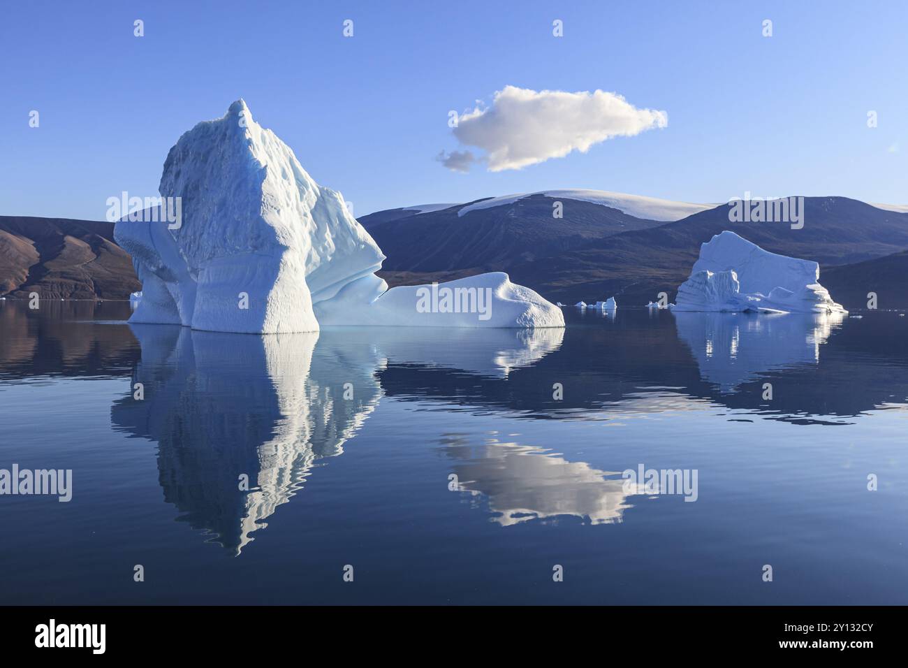 Icebergs in fjord off Bergen, sunny, Scoresby Sound, East Greenland ...