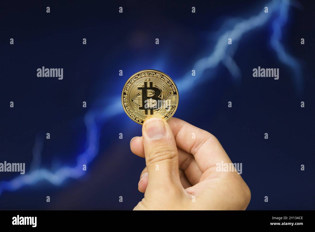 Golden bitcoin on lightning background hi-res stock photography and ...