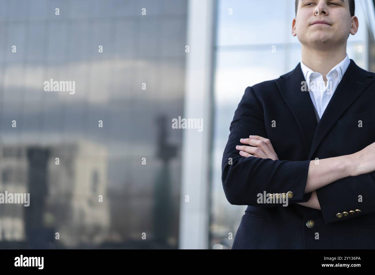 Photo of business man in classic black suit, shirt holding hands folded ...