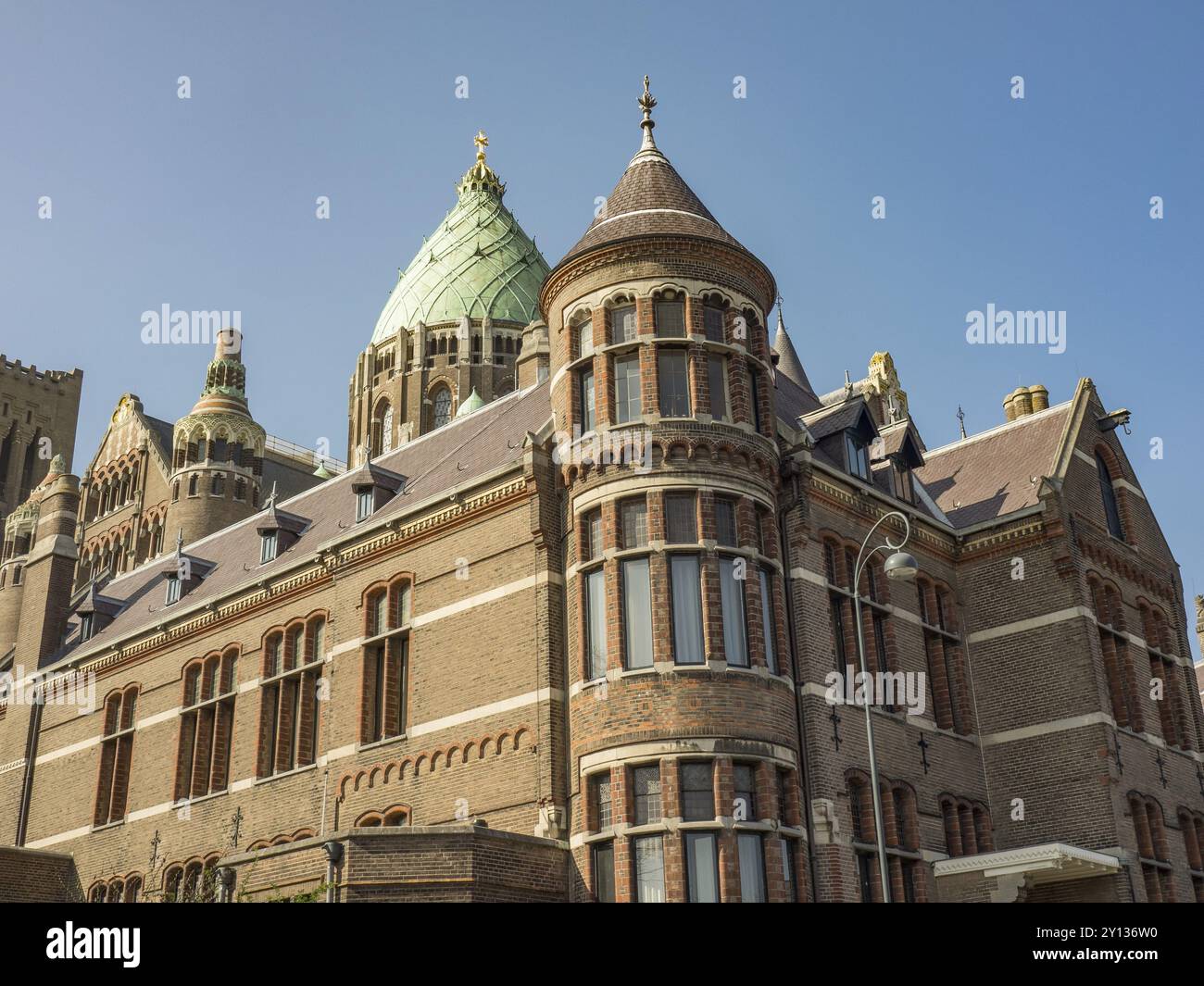 A magnificent building with Gothic architectural elements and windows ...
