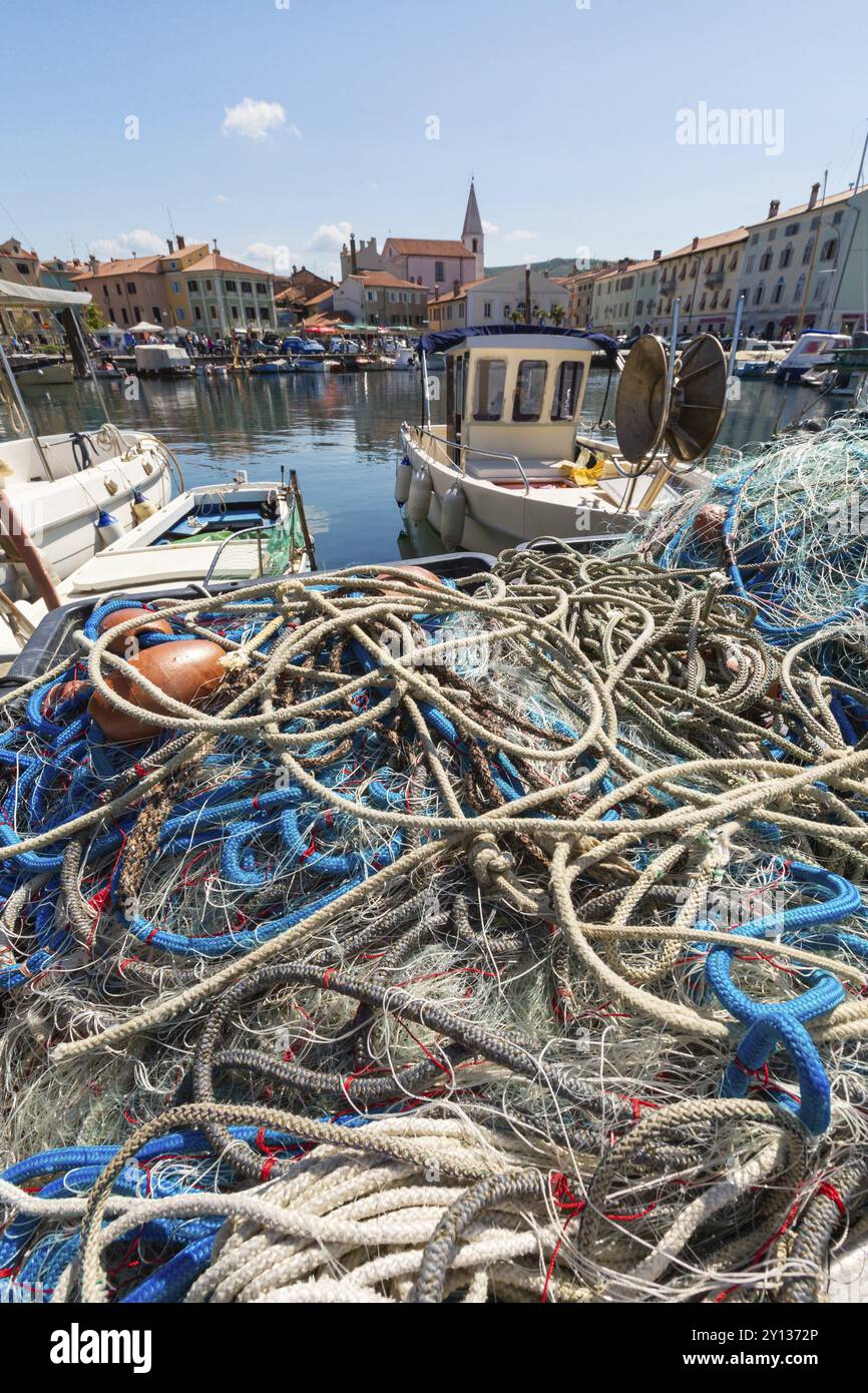 Scenic harbour with boats and brightly coloured houses on the fishing ...