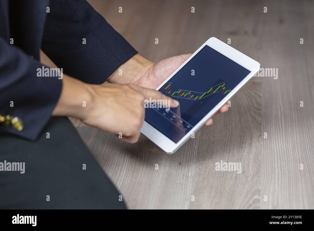 Stock Trader Looking At Stock Chart on Screen Stock Photo - Alamy