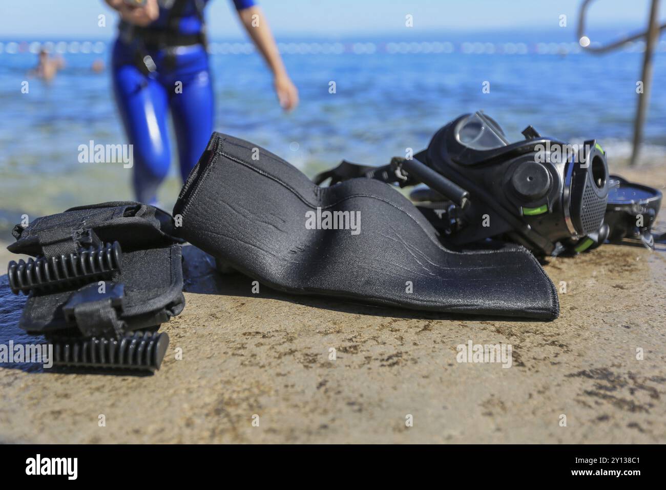 Scuba diving equipment on a beach shore Stock Photo - Alamy