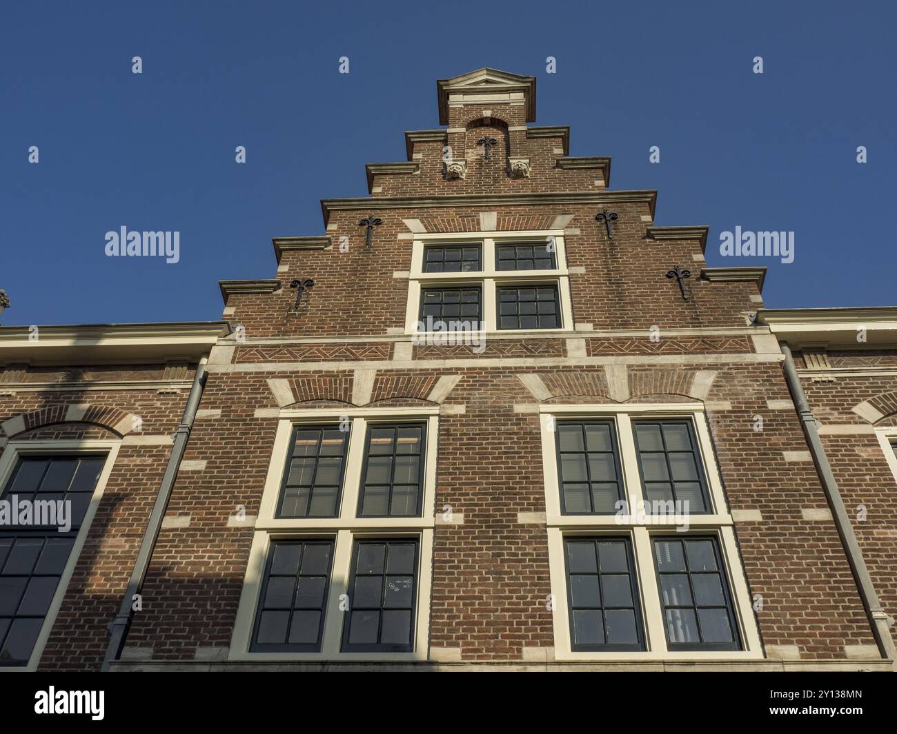 Historic building with mullioned windows and striking stepped gable ...