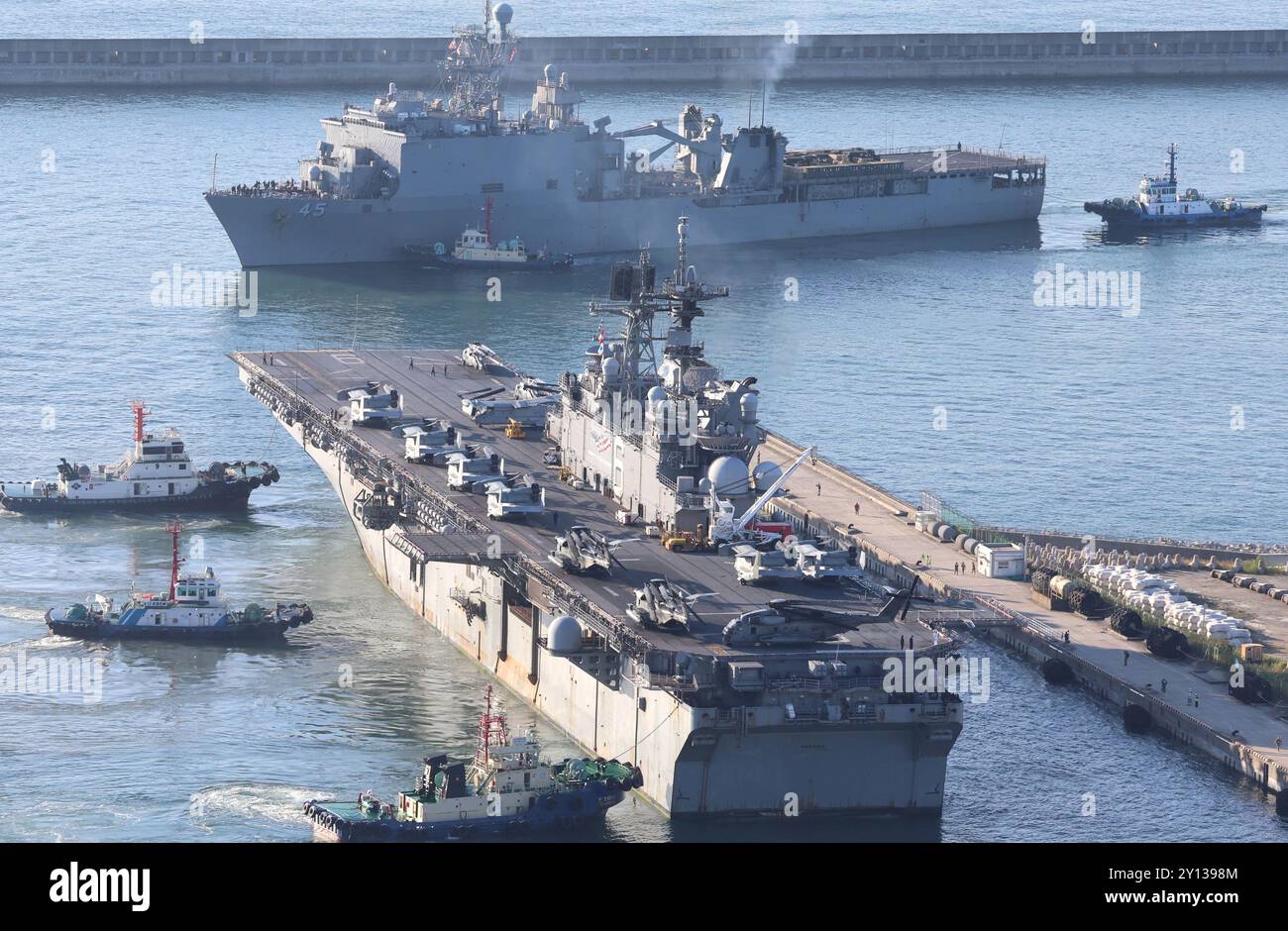 05th Sep, 2024. U.S. naval ships enter S. Korea The USS America (bottom ...