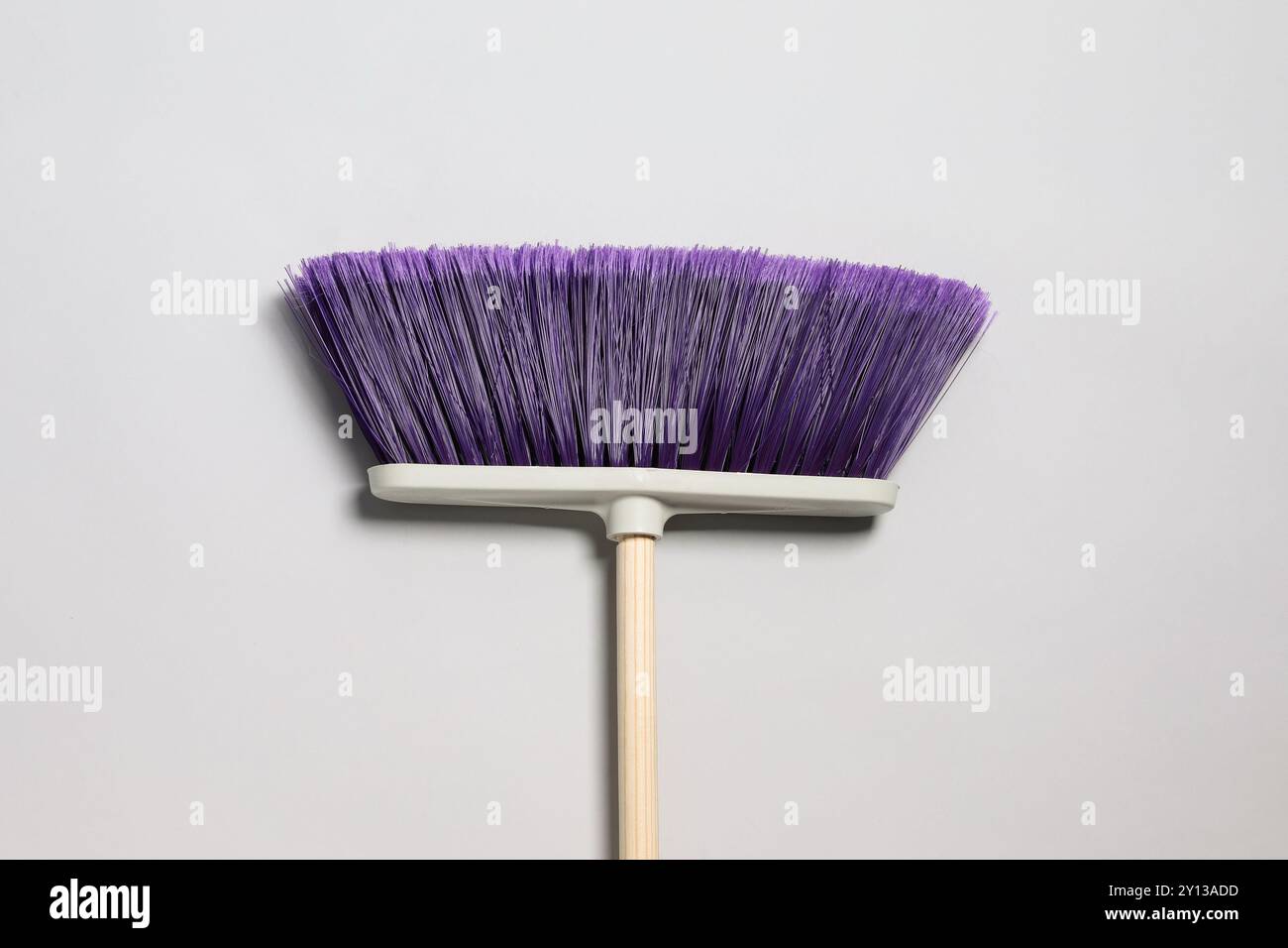 One broom on light grey background, top view. Cleaning tool Stock Photo ...