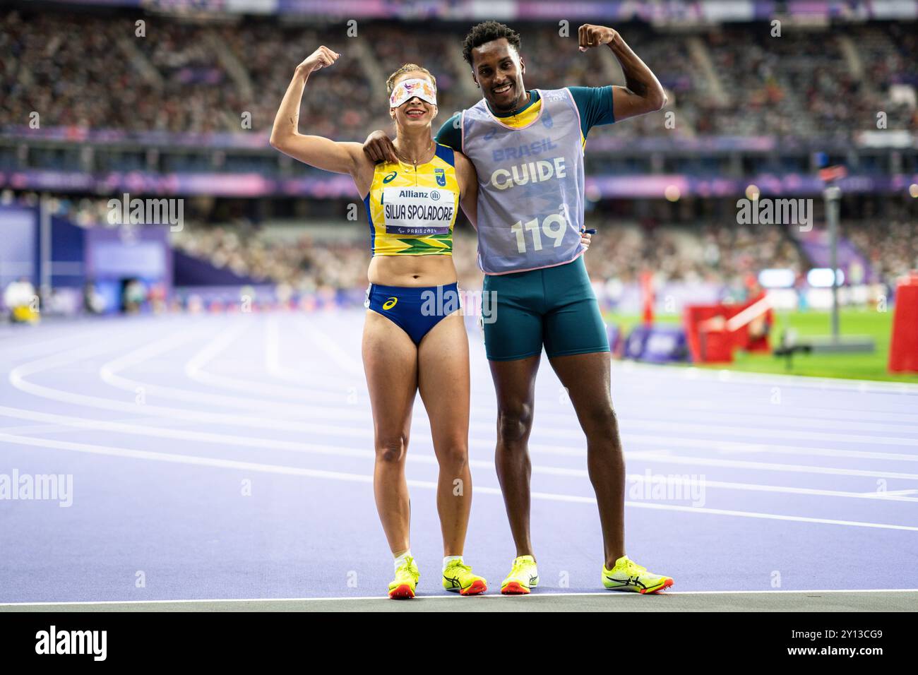Lorena Silva Spoladore and guide Renato Ben Hur Costa Oliveira of Team Brazil celebrate winning ...