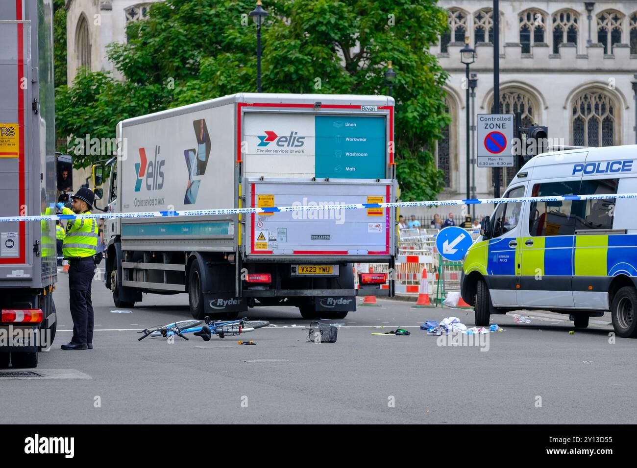 Parliament Square is cordoned off with police tape after a cyclist was ...