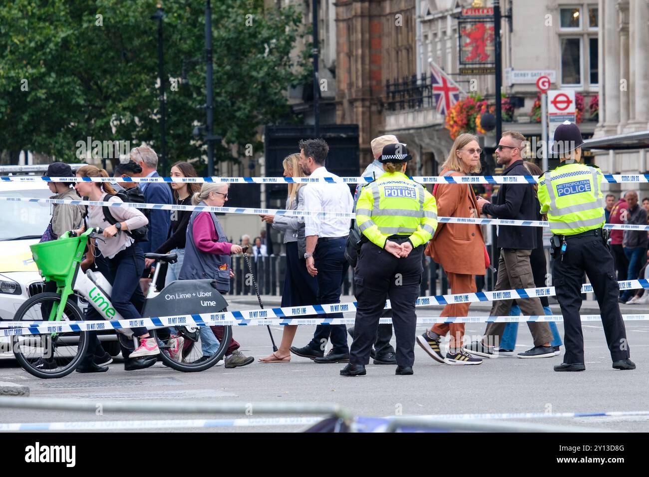 Parliament Square is cordoned off with police tape after a cyclist was ...