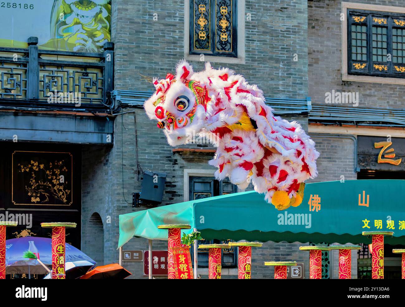 Lion dance display by skilled martial artistes at the ancestral temple ...