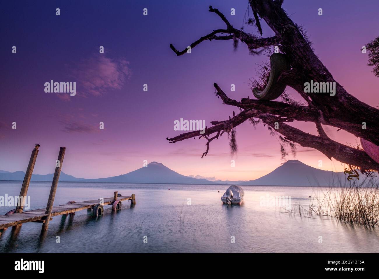 Traditional moorings and volcanoes of Atitlan 3537 m. and San Pedro ...