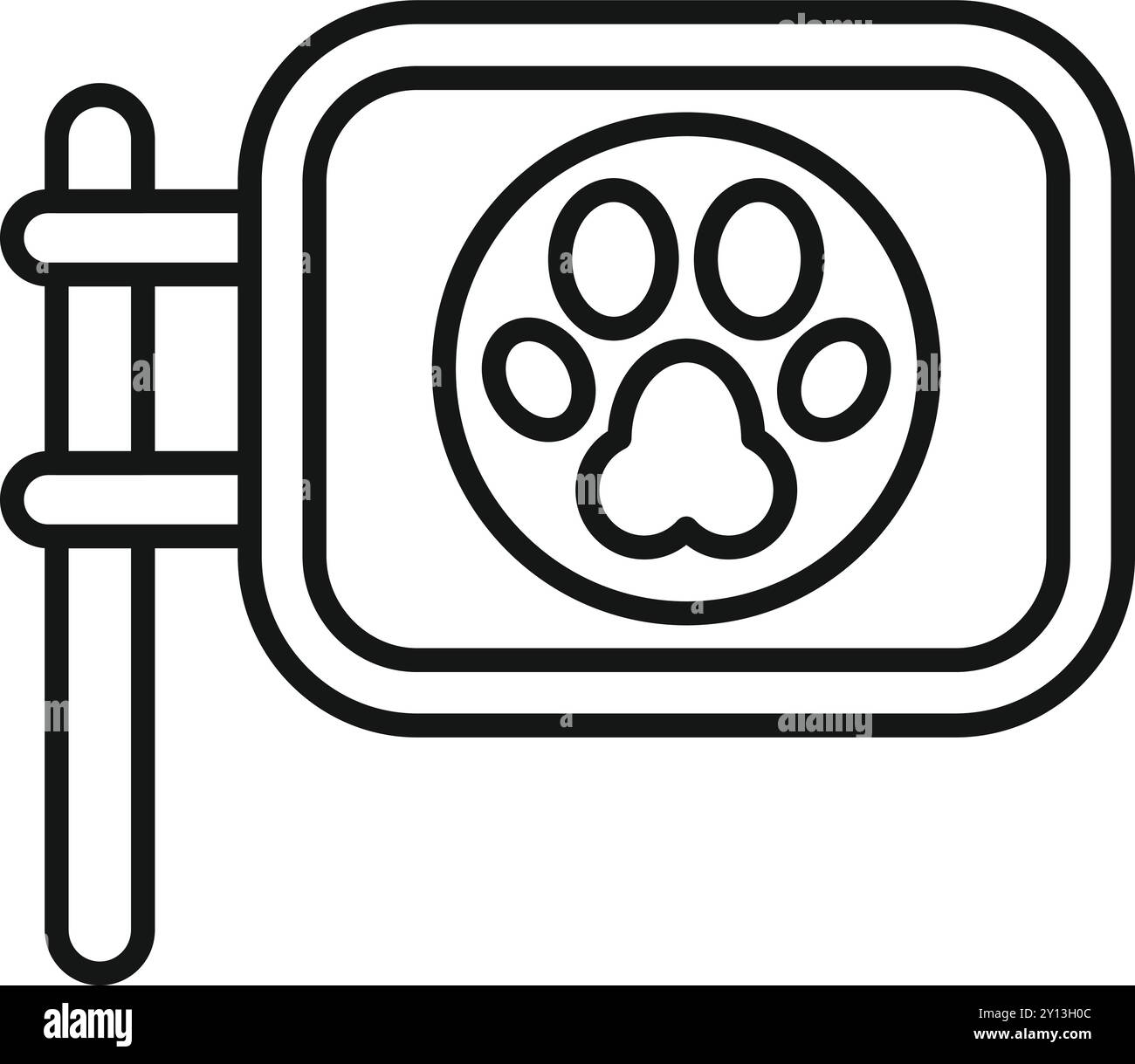 Simple wooden road sign showing a paw print, indicating a designated ...