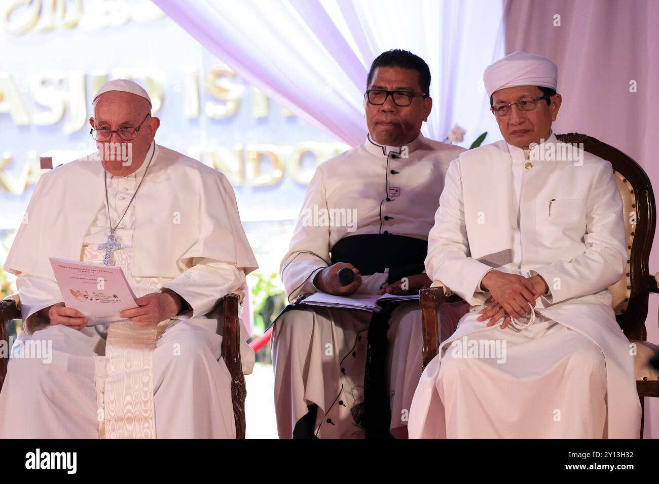 Pope Francis, left, and the grand imam of Istiqlal Mosque Nasaruddin ...