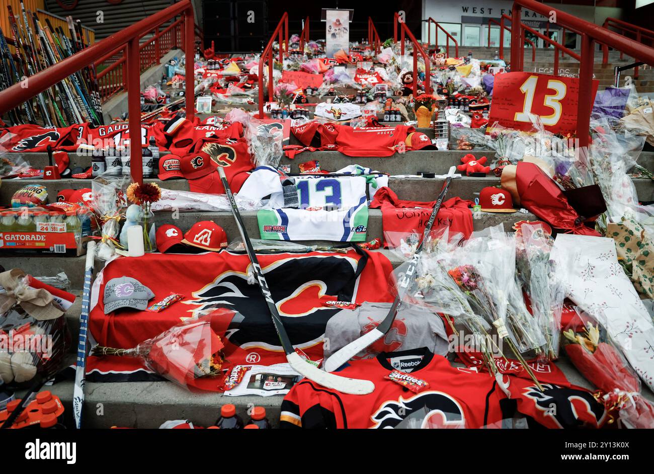 Flowers and memorabilia for former Calgary Flames player Johnny ...