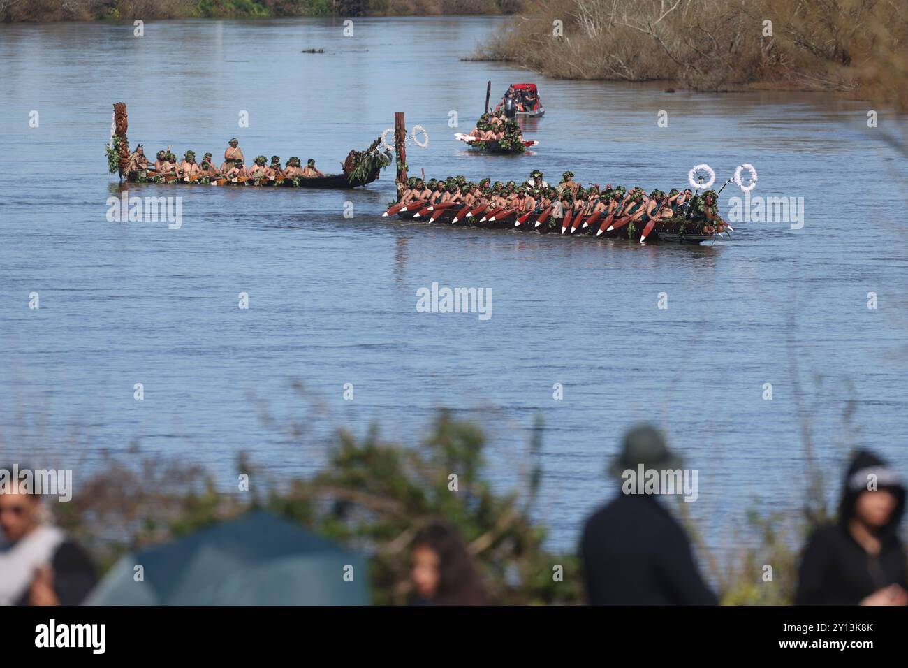 Wakas, a traditional canoe, are paddled by warriors as part of the ...