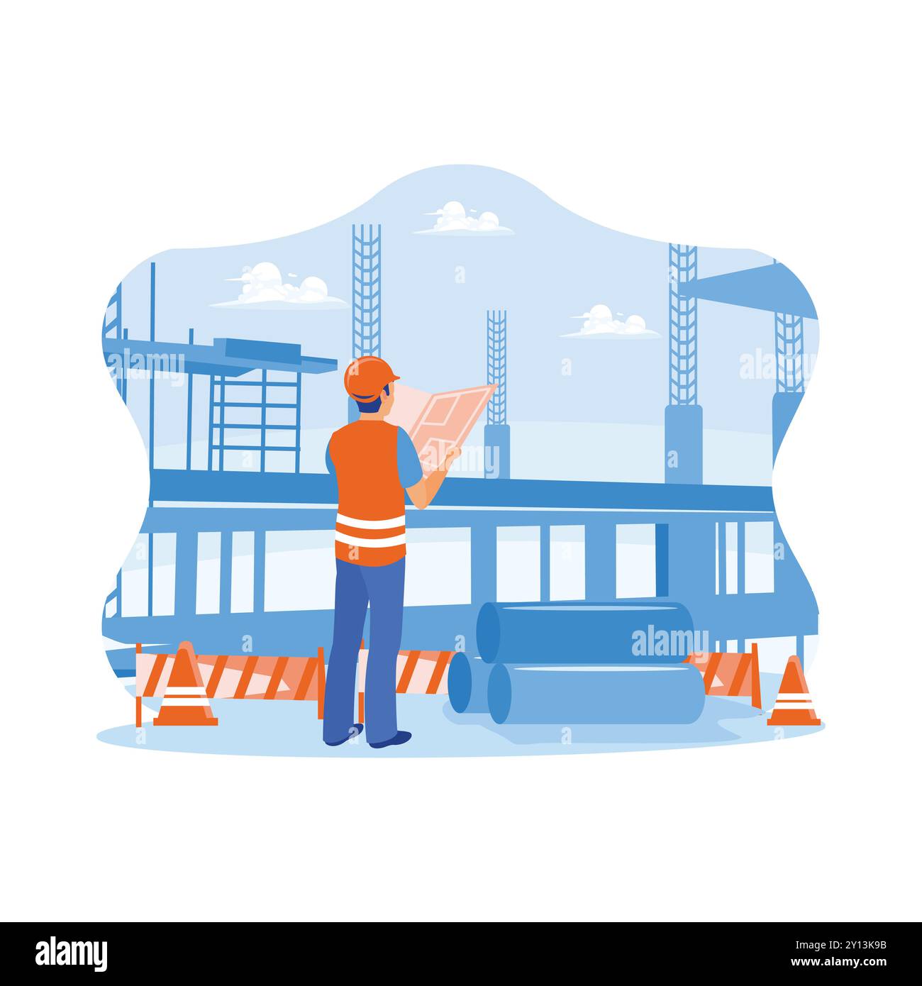 Civil engineer standing on a construction site holding a blueprint in ...