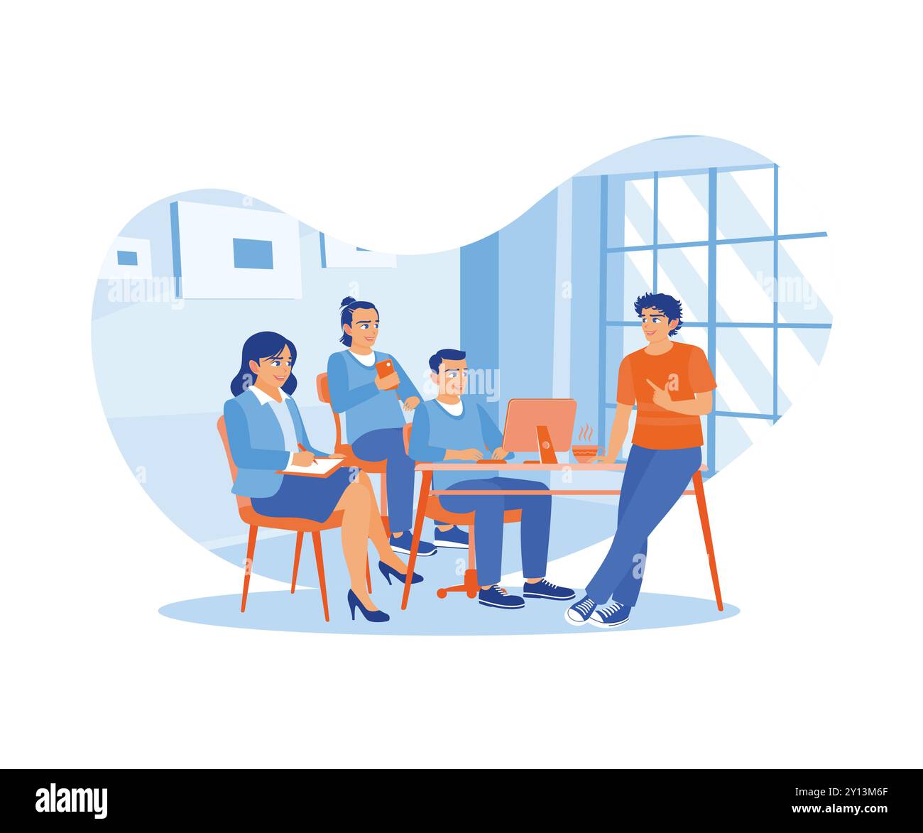 Diverse employees have a meeting in the office. The male leader ...