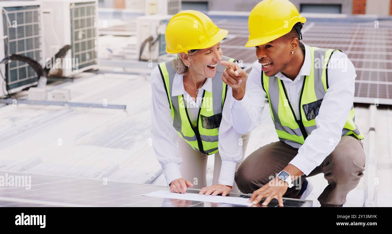 Solar panel, rooftop and business people with blueprint for planning ...