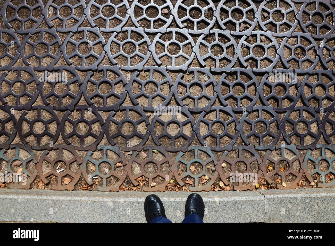 Old metal pavement on the plaza Stock Photo - Alamy