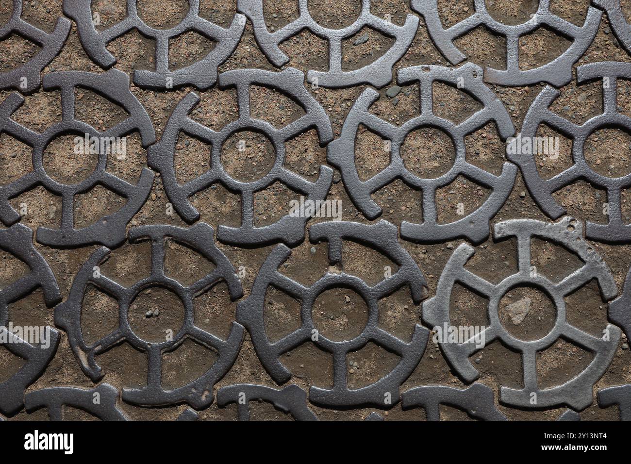 Decorative metal pavement on the square Stock Photo - Alamy