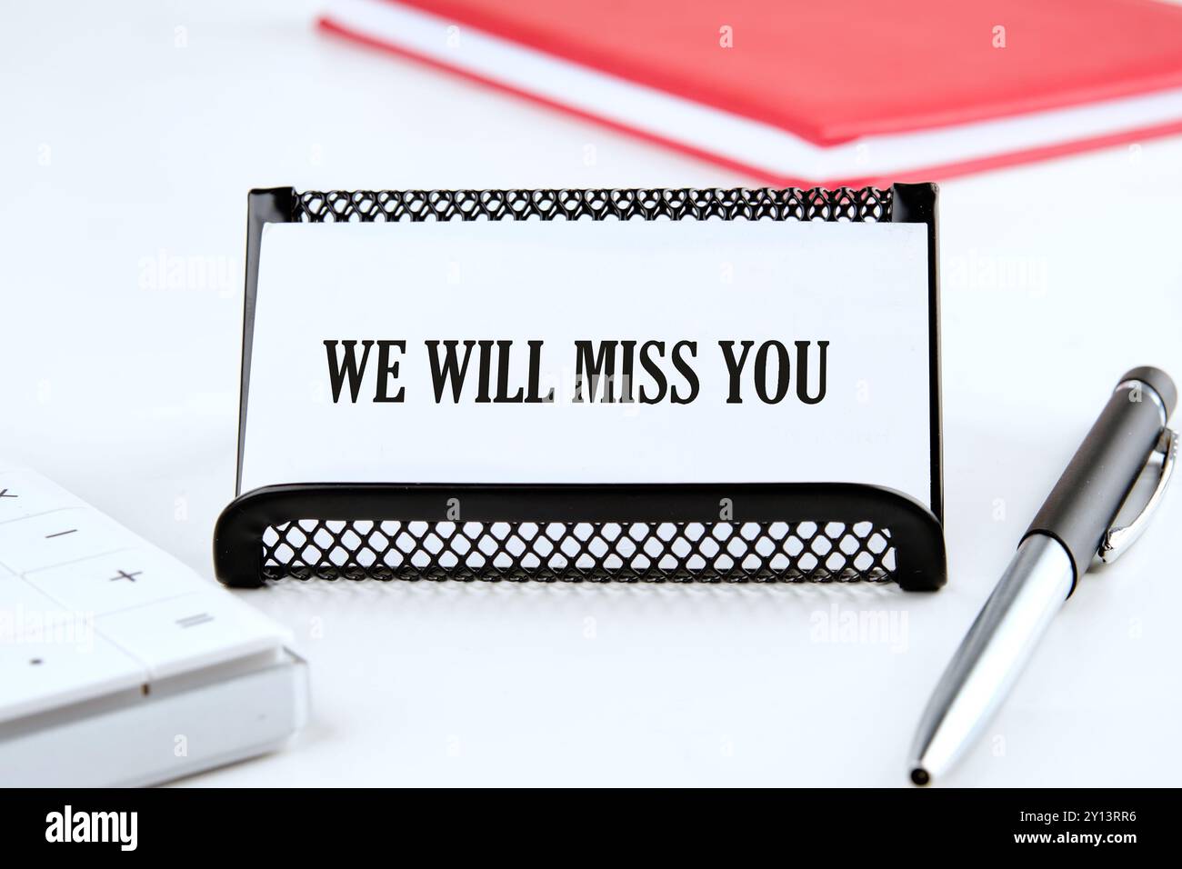 WE WILL MISS YOU written on a business card on a white background Stock ...