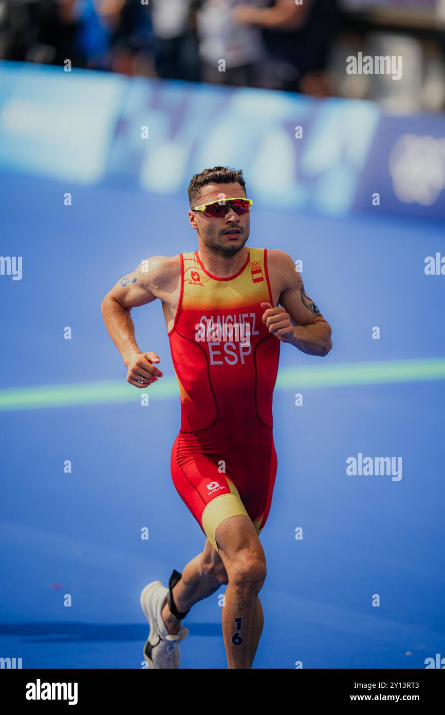 Roberto Sanchez Mantecon participating in the triathlon at the Paris ...