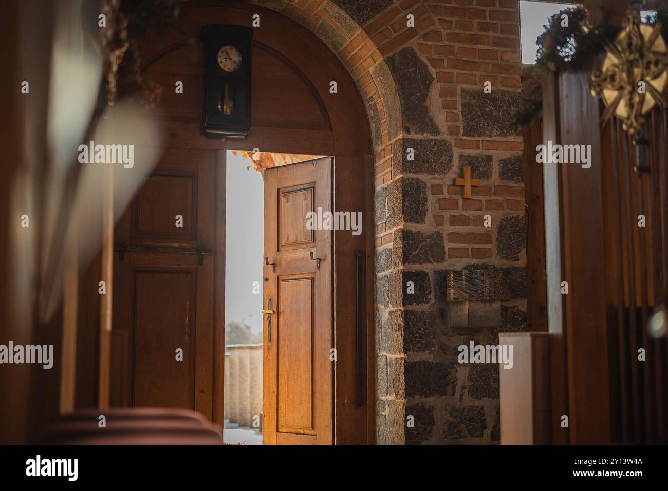 Inside view of a church main door opened Stock Photo - Alamy