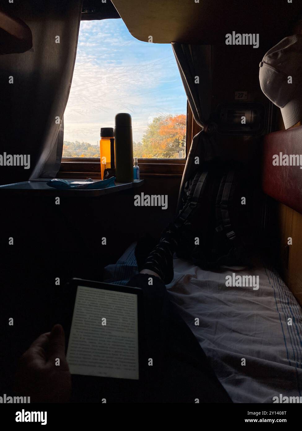Cozy Train Compartment with Scenic View Stock Photo - Alamy