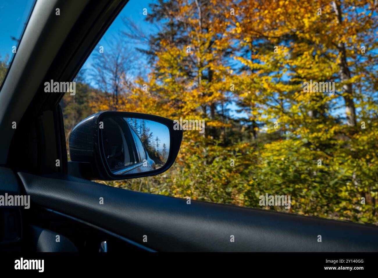 Autumn Reflection in Car Side Mirror Stock Photo - Alamy
