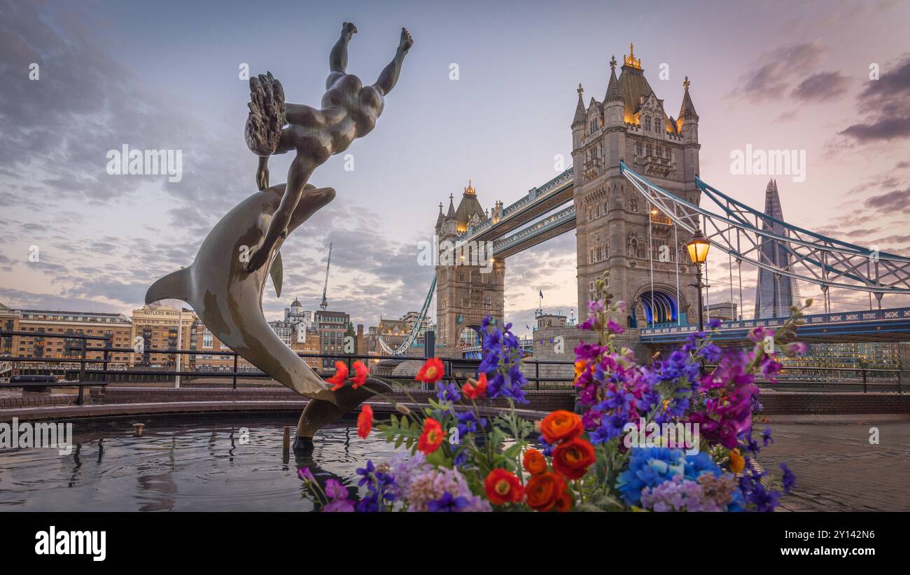 Girl With A Dolphin - Tower Bridge Stock Photo - Alamy