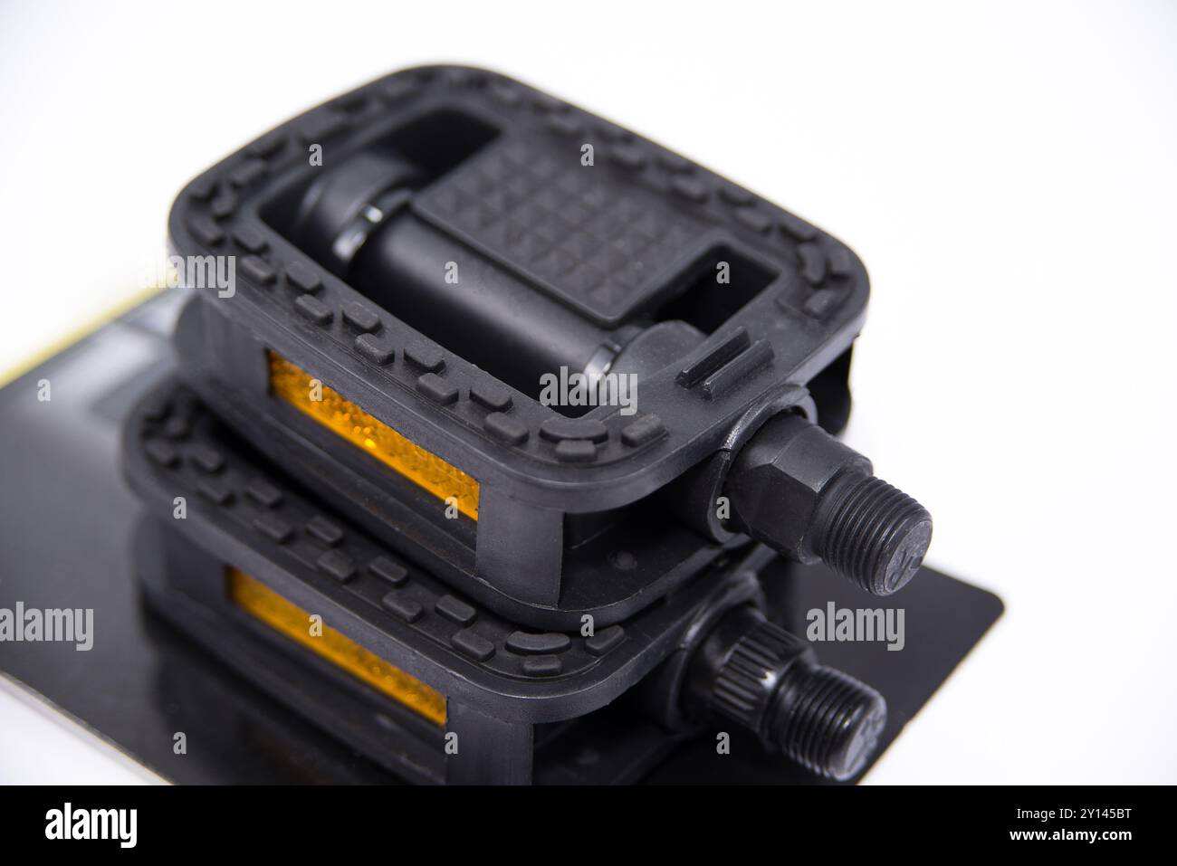 New rubber bicycle pedal on a white Stock Photo - Alamy