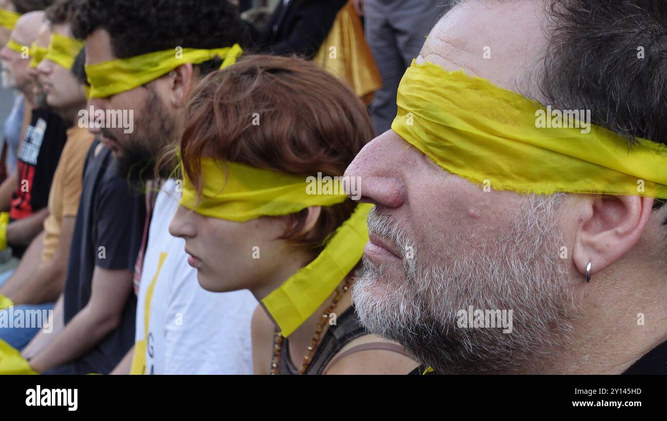 JERUSALEM - SEPTEMBER 3: Protesters wear yellow blindfolds to symbolize ...