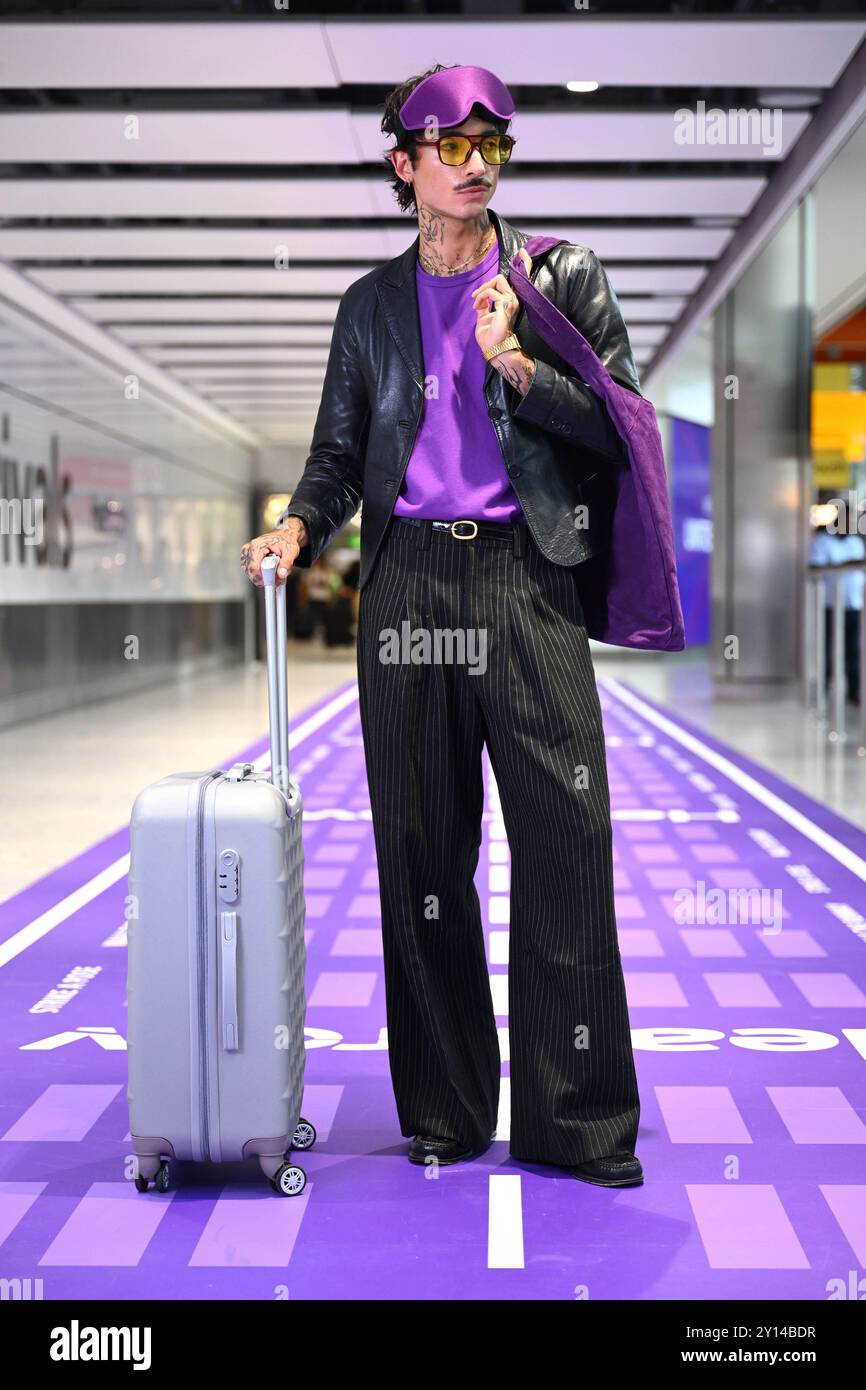 EDITORIAL USE ONLY Model Gustavo walks a new runway at Heathrow Airport ...
