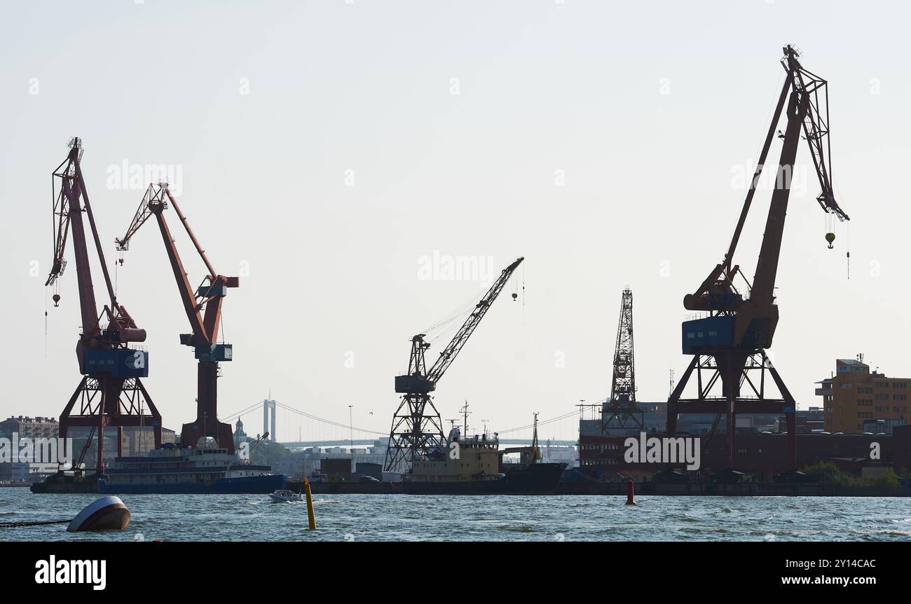 Profile of freight cranes in Gothenburg harbour, Sweden. Industrial ...