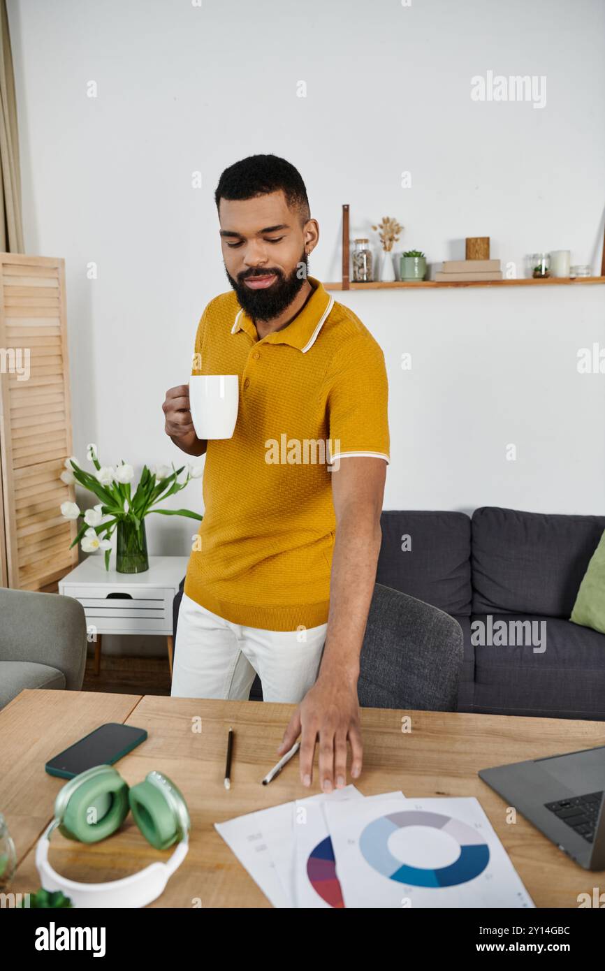 Stylish man sips coffee hi-res stock photography and images - Alamy