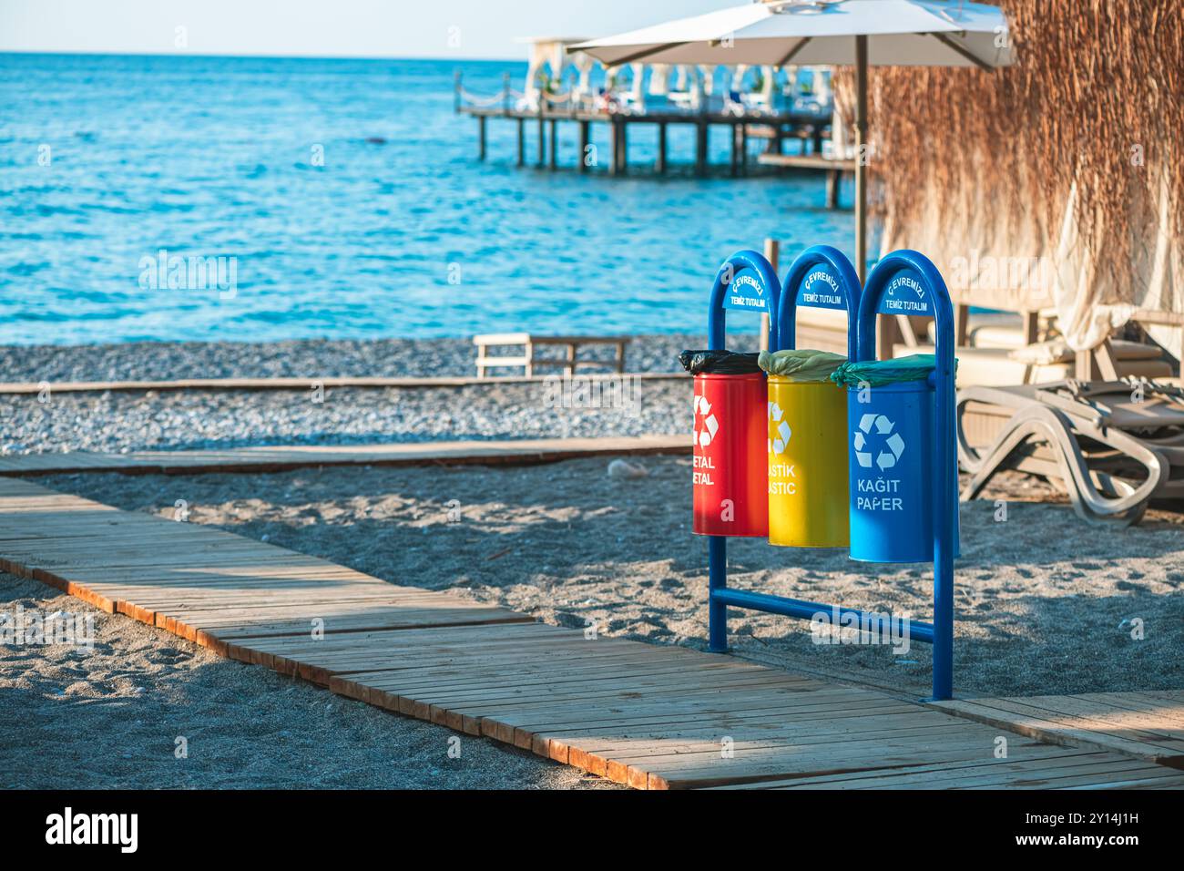containers, trash bins for separate waste on the beach, waste recycling ...