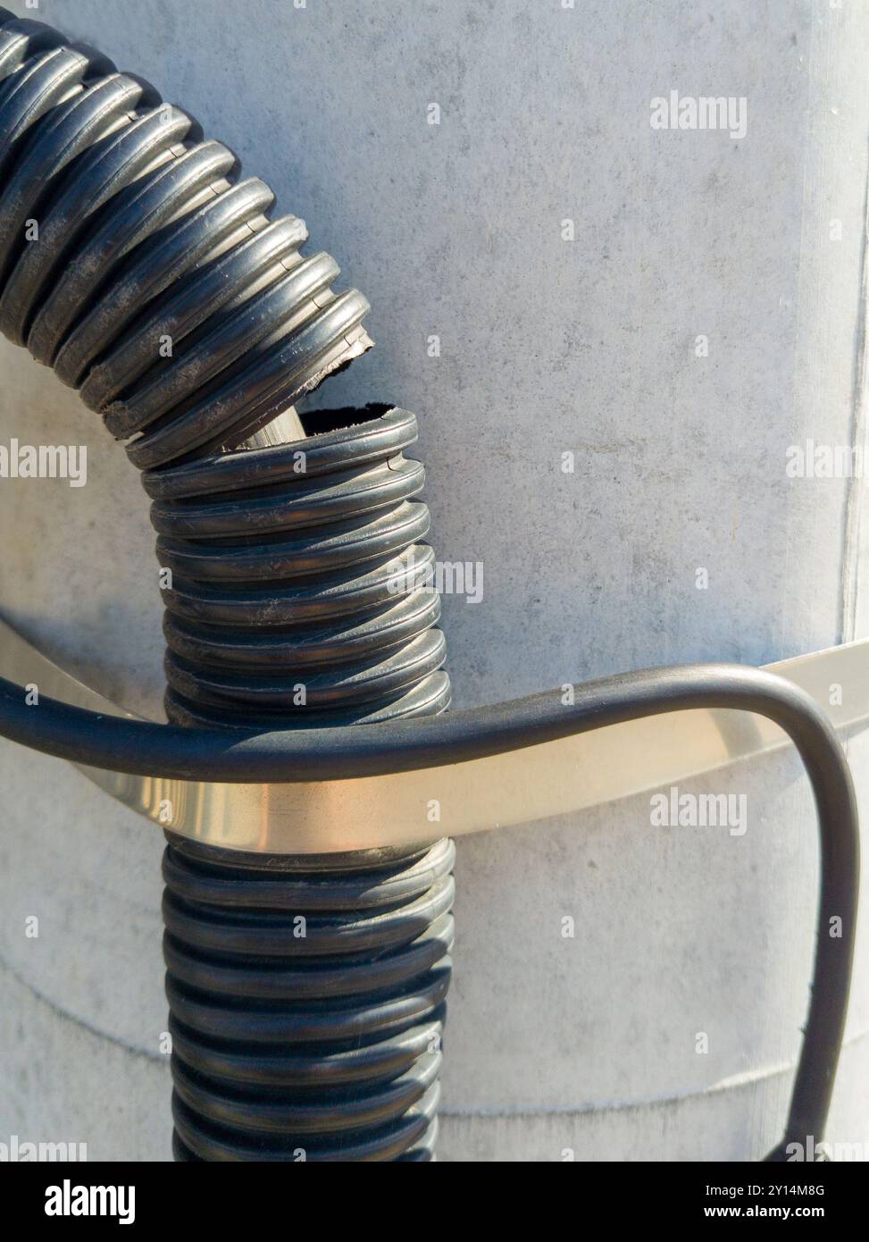 Poorly Secured Electrical Installation with Damaged Conduit Stock Photo ...