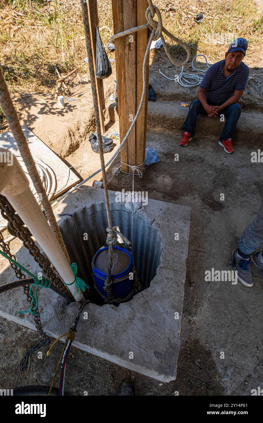 traditional well excavation, Xullmal village, Guatemala, Central ...