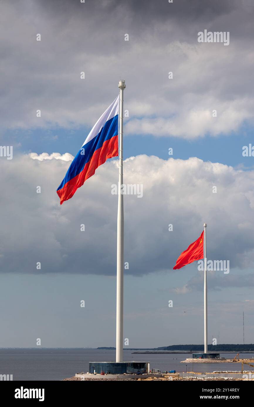 Historical flags of USSR and State Flag of Russian Federation is flying ...