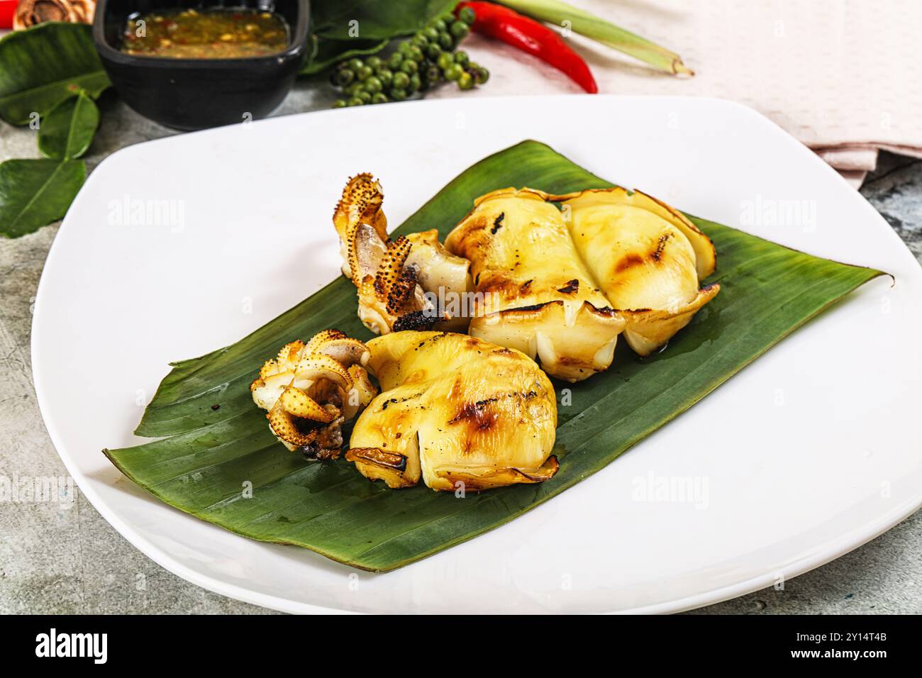 Delicous Grilled cuttlefish with sauce asian style Stock Photo - Alamy