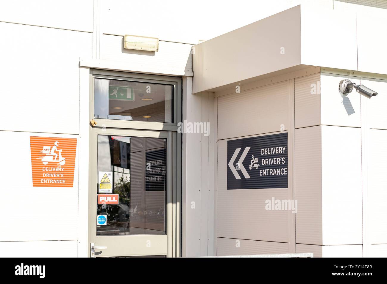 Rear door entrance (with signs) for all local delivery drivers to ...