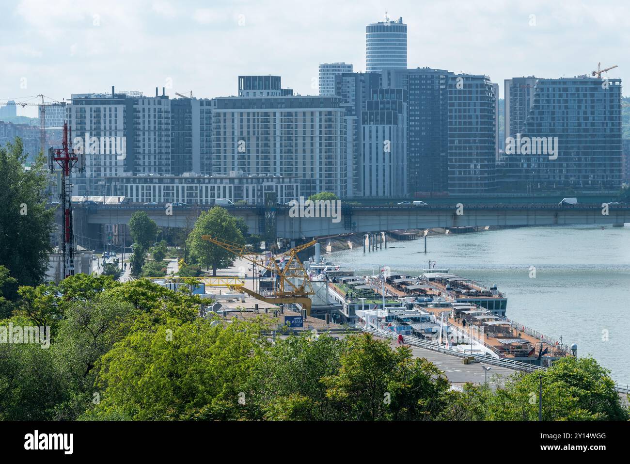 Belgrade waterfront with new buildings and cruise ships moored. April ...