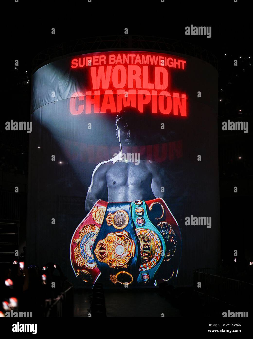 The screen displays an image of Japanese champion Naoya Inoue before the IBF-WBA-WBC-WBO super ...