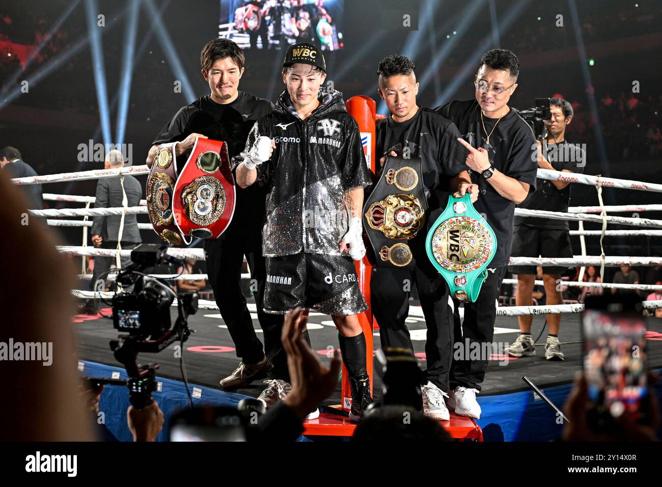 Japanese champion Naoya Inoue, second left, poses with his cousin Koki Inoue, left, brother ...