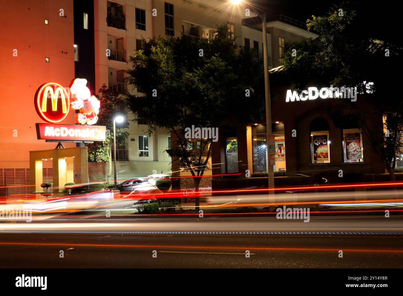 McDonald's fast food restaurant by night - Long Exposure Photo Stock ...