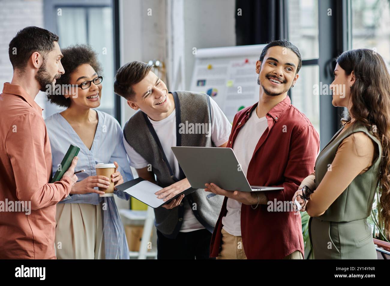 Colleagues engage in conversation during a challenging moment at work ...