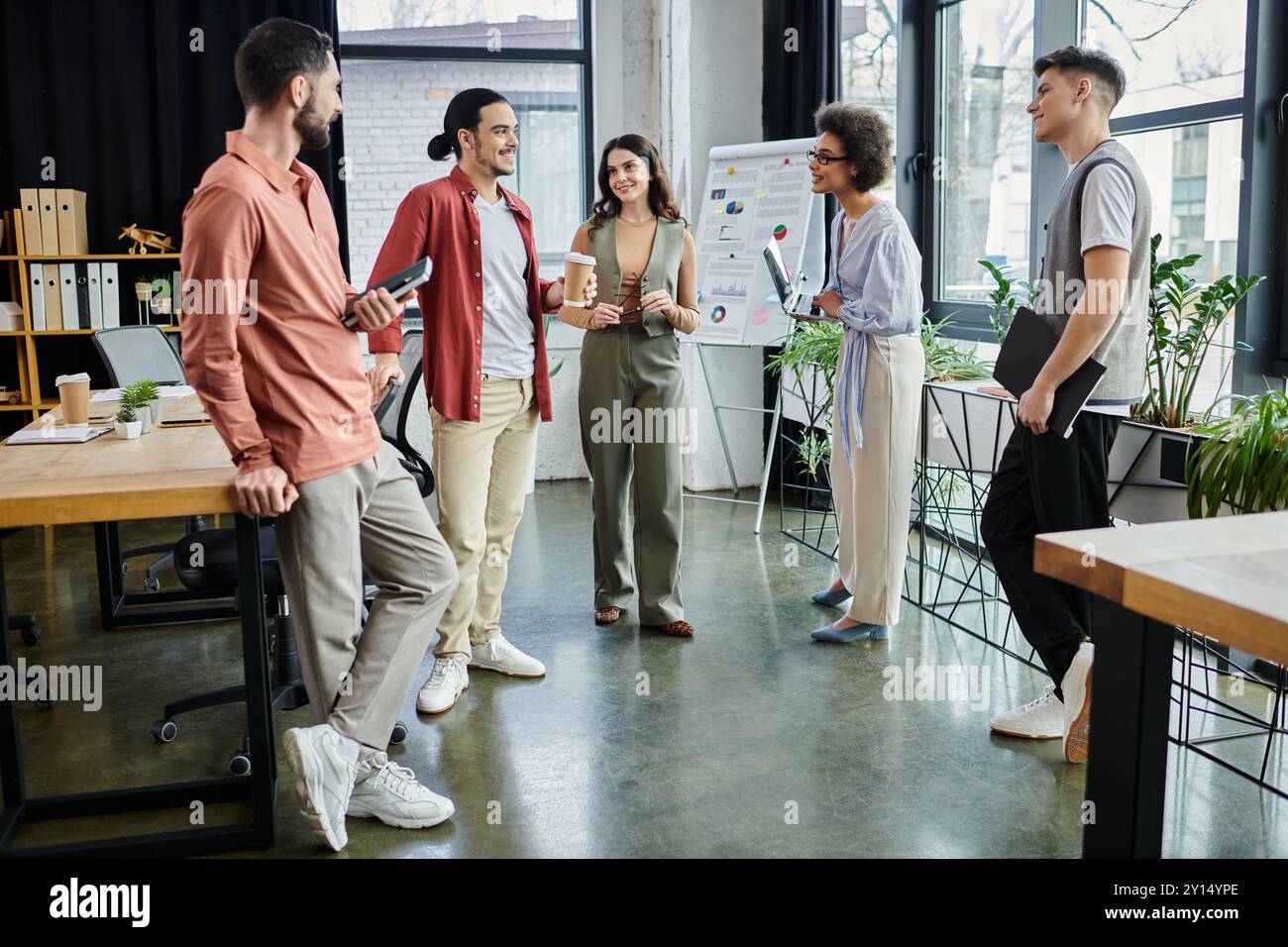 Team members share their thoughts in a relaxed atmosphere amidst ...