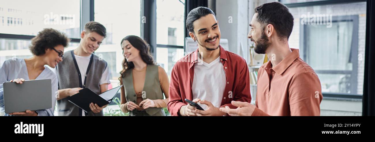 Team members engage in conversations amid a challenging layoff ...