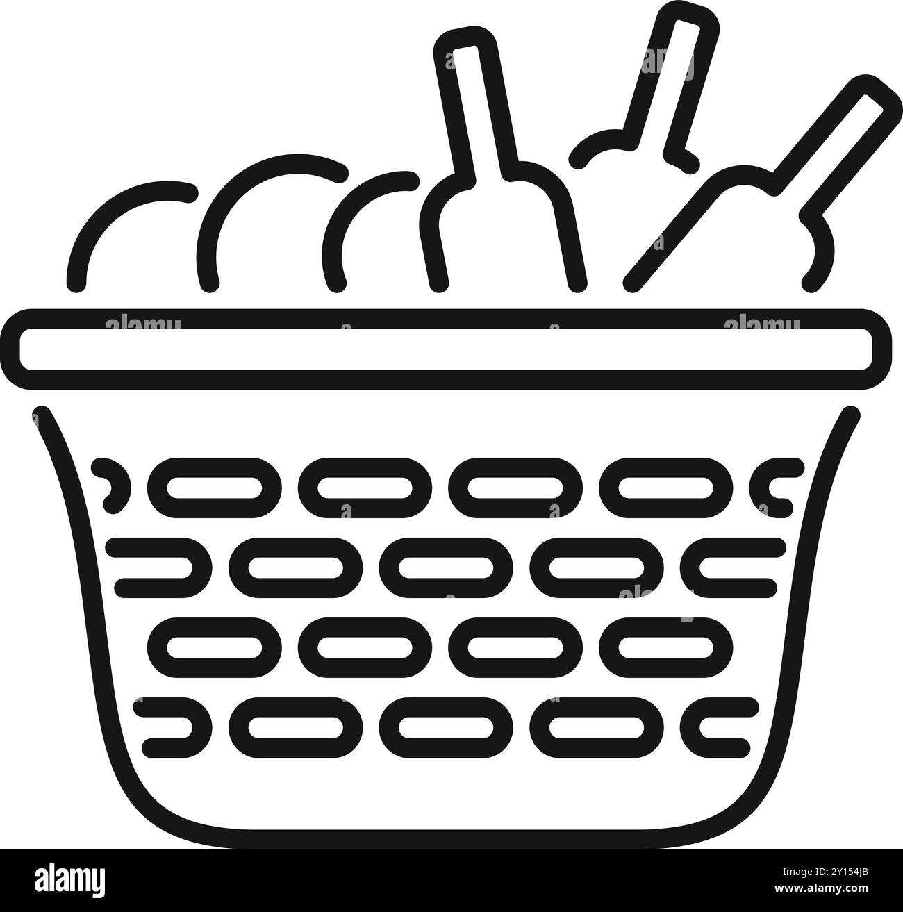 Laundry basket full of dirty clothes, with bottles of detergent ...