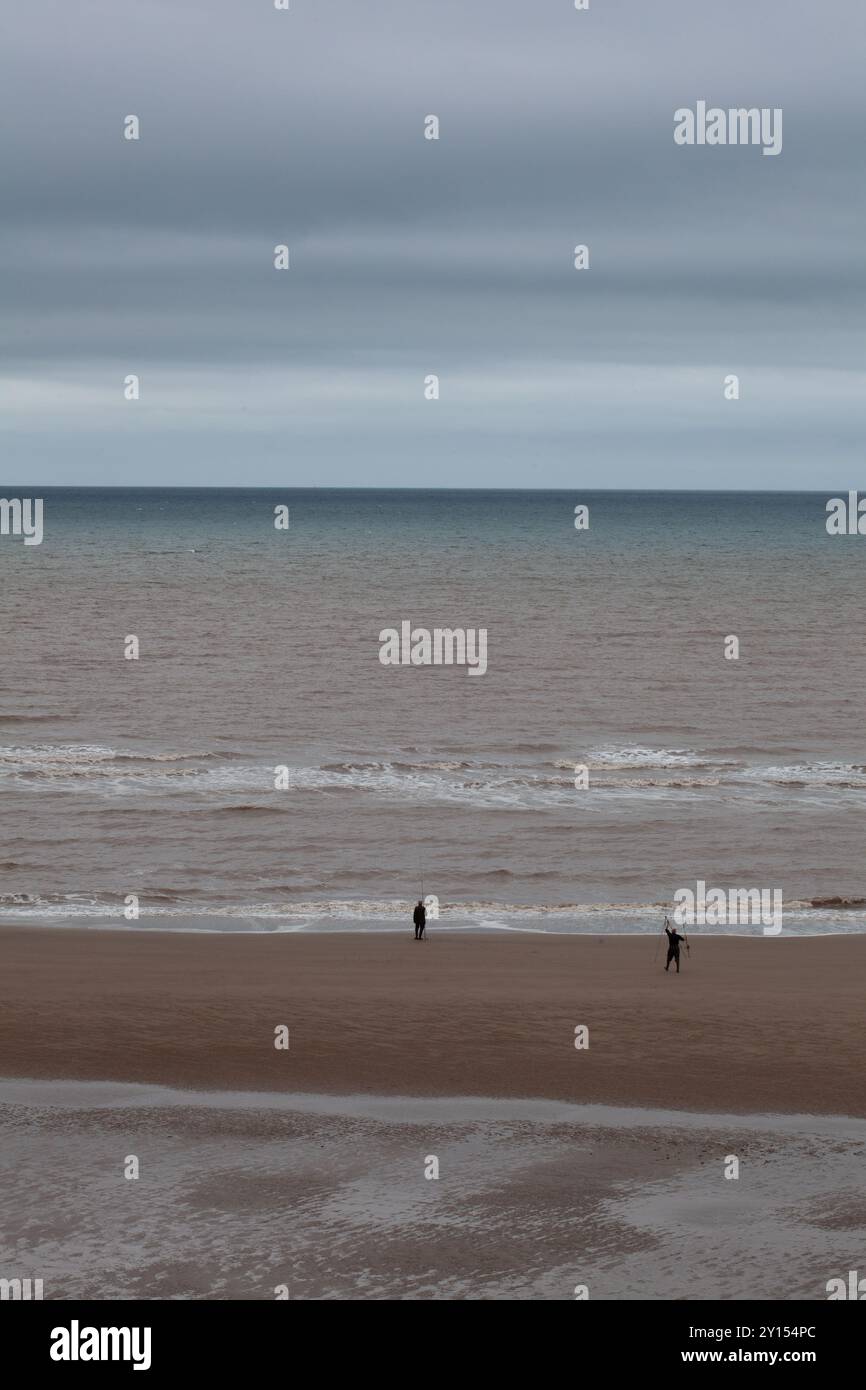Fishing on beach at East Yorkshire Coast, England, UK Stock Photo - Alamy